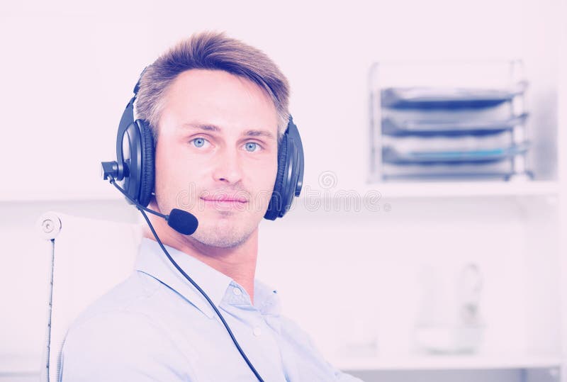 Man Talking on Headset at Office Stock Image - Image of positive ...