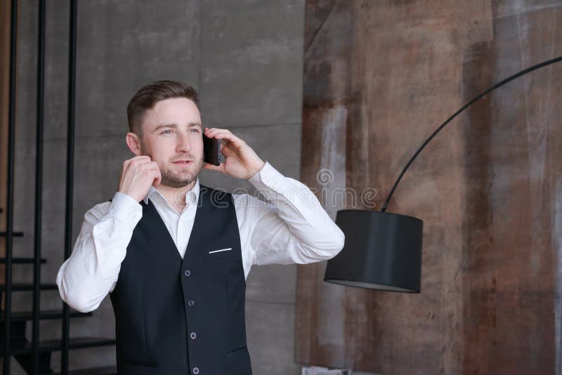 Man Talking His Cell Phone Wearing Vest Stock Photos - Free & Royalty ...