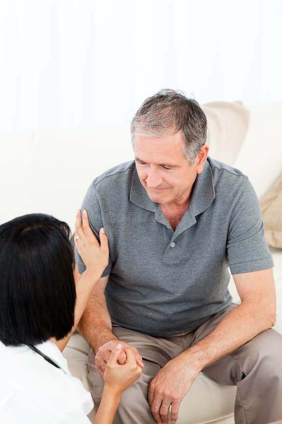 Man talking with his nurse stock photo. Image of hospital - 18109116