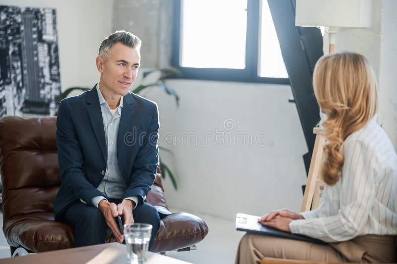 Man Talking with His Psychologist and Looking Frustrated Stock Photo ...