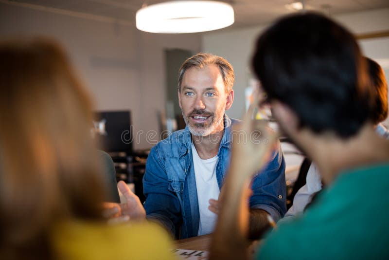 Man talking with his team stock image. Image of office - 88945661