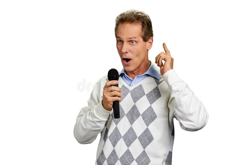 Man Talking into Microphone on White Background. Stock Photo - Image of ...