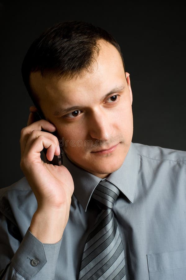 Man Talking on the Mobile Phone Stock Photo - Image of strict, talk ...