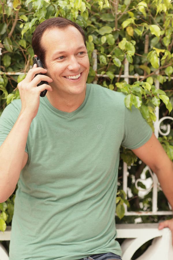 Man talking on the phone stock photo. Image of mature - 19262034