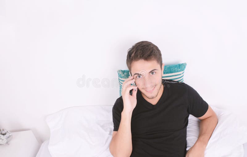Man Talking on Phone in Bed. Stock Image - Image of home, communication ...