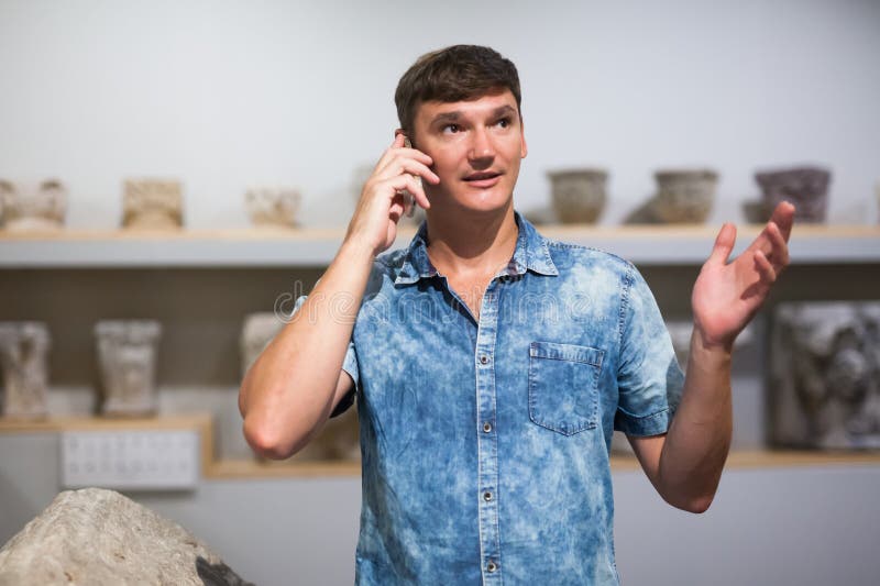 Man Talking by Phone in Museum Stock Photo - Image of architecture ...