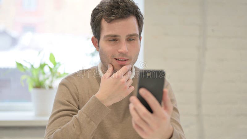 Man Talking Video Call on Smartphone in Office Stock Photo - Image of ...