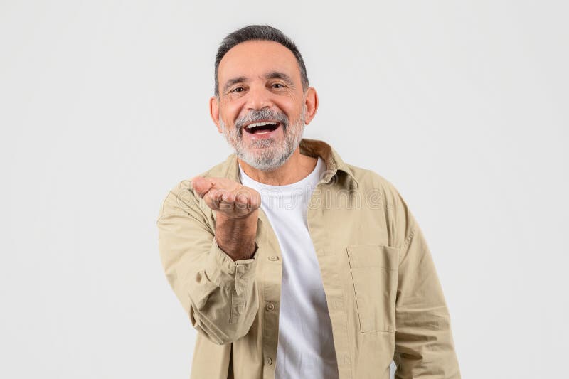 Man in a Tan Jacket Making a Funny Face Stock Image - Image of jesting ...