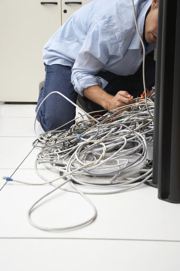 Man with Tangled Computer Wires Stock Photo - Image of messed, computer ...