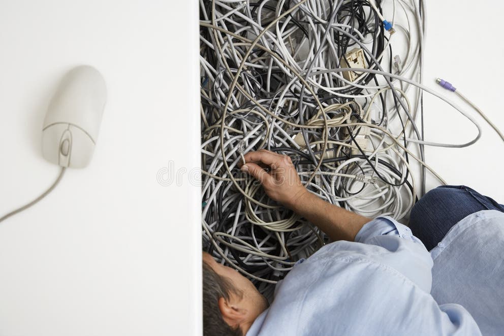 Man with Tangled Computer Wires Stock Photo - Image of floor, business ...