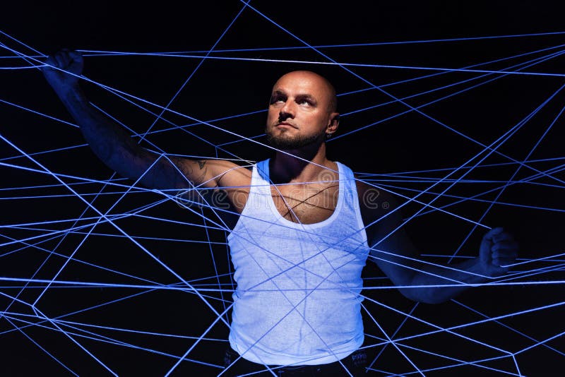 Man Tangled in White Threads with Hands Up Stock Photo - Image of ...
