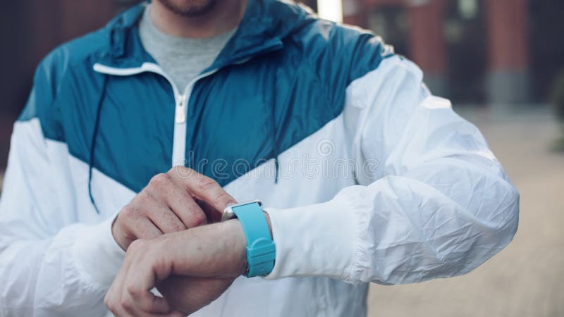 Man Tapping the Screen of Smart Watches Stock Photo - Image of ...