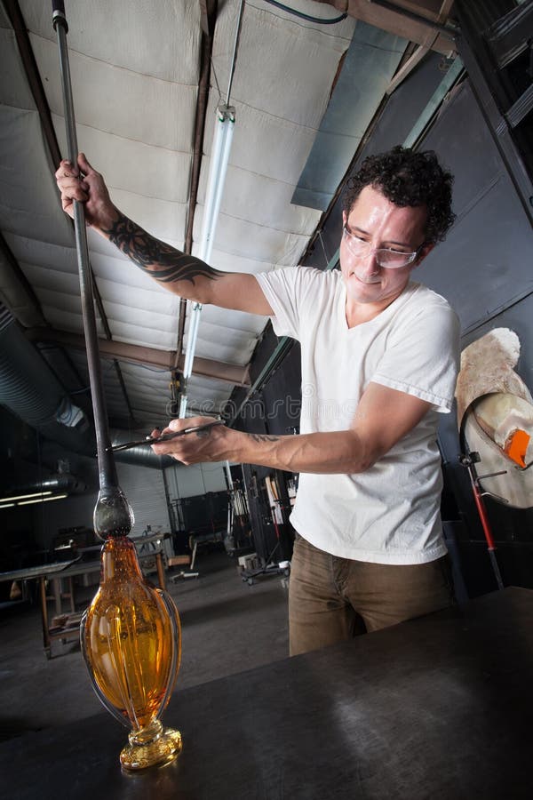Man Creating Glass Object stock photo. Image of blast - 30306600
