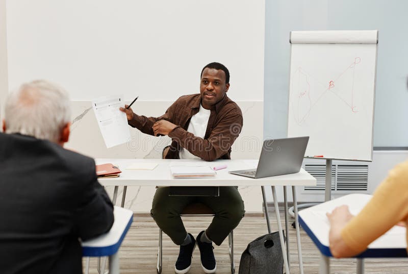 Man Teaching People at Training Stock Photo - Image of speaker, teacher ...
