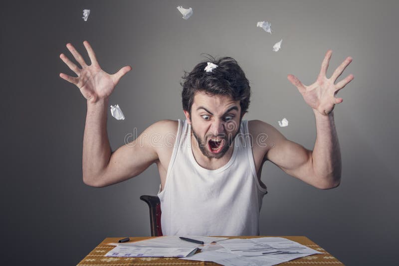 Man tearing apart bills stock photo. Image of finances - 48825718