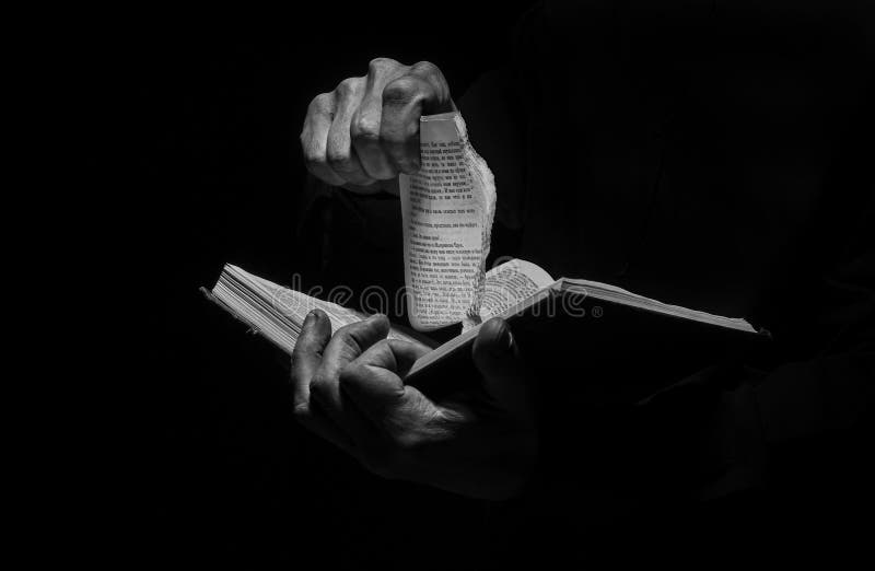 Man Tearing a Page from the Book Stock Photo - Image of paper ...