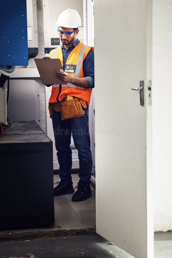 Man, Technician and Engineering with Clipboard in Control Room, Writing ...