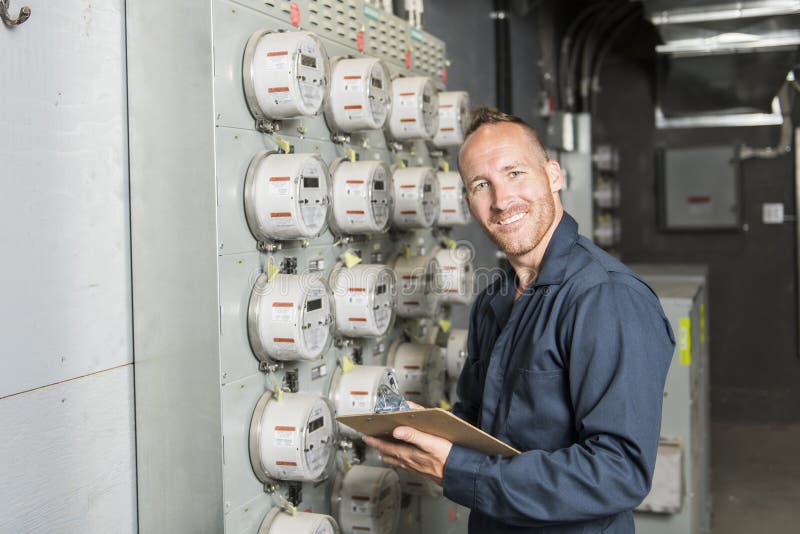 Man Technician Servicing at Work on Electric Room Stock Photo - Image ...