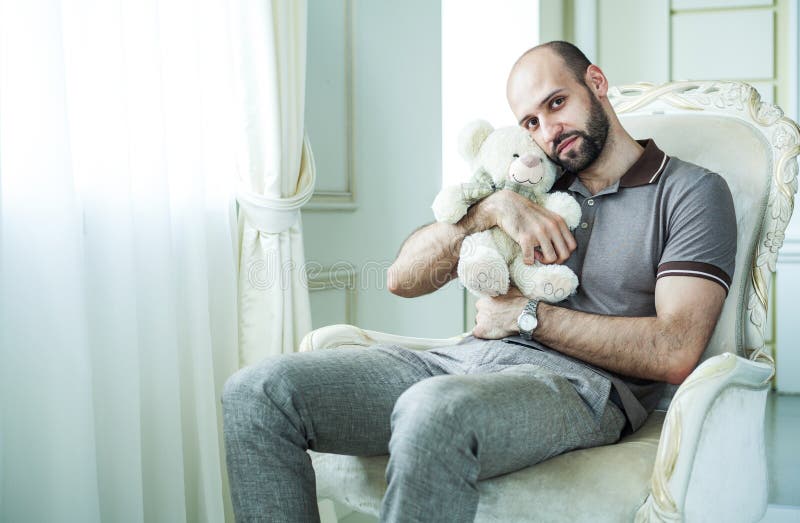Man with teddy bear stock image. Image of feelings, lovely - 40872555