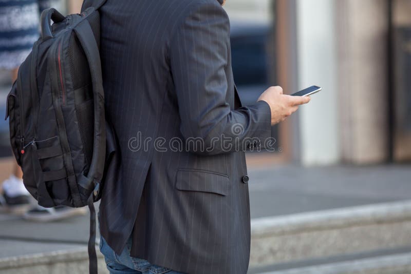 Man on Telephone Call with Backpack Outside Stock Image - Image of ...