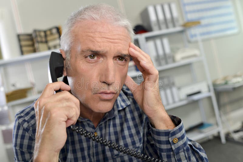 Man on Telephone Looking Concerned Stock Image - Image of business ...