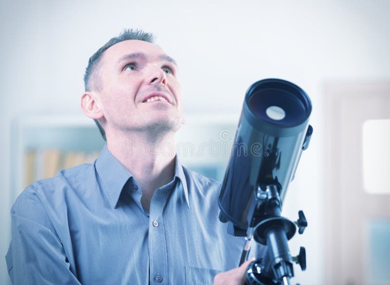 Man with telescope stock photo. Image of professional - 36984326
