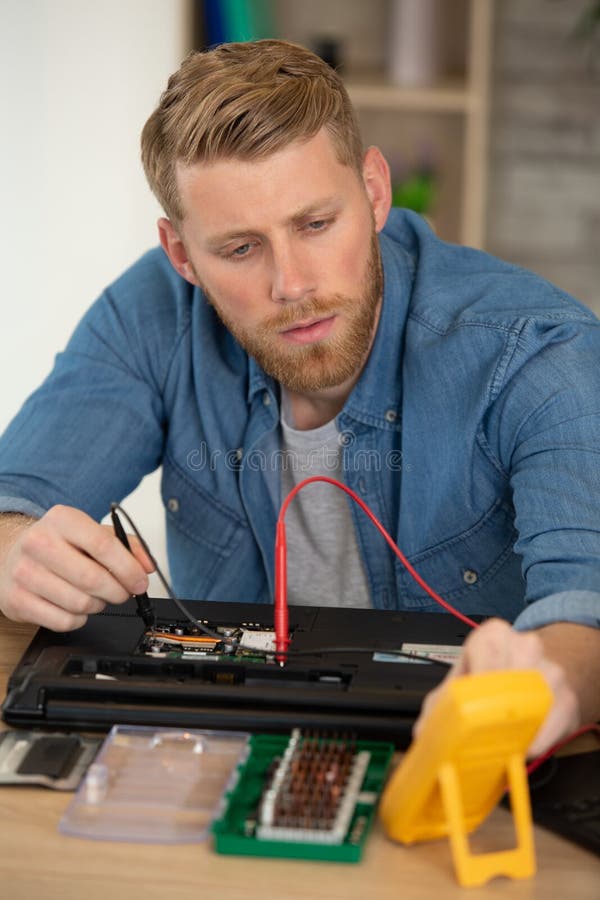 Man Testing Broken Laptop Multimeter Stock Photos - Free & Royalty-Free ...