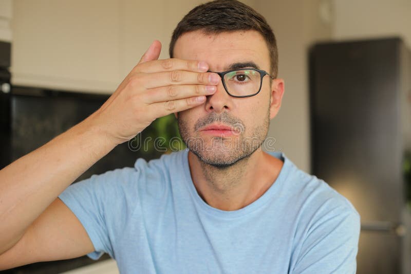 Man testing his own vision stock image. Image of incomplete - 329478197