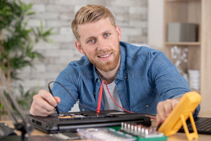 Man Testing Laptop with Multimeter Stock Image - Image of hand, power ...