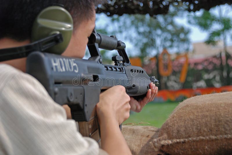 Man Testing The Machine Gun Picture. Image: 3107116