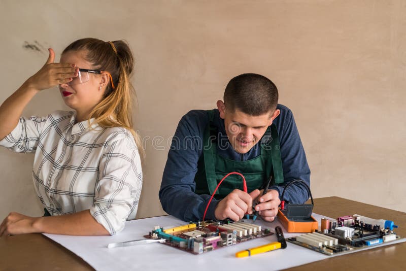 Man Testing Motherboard of Personal Computer by Multimeter Stock Photo ...