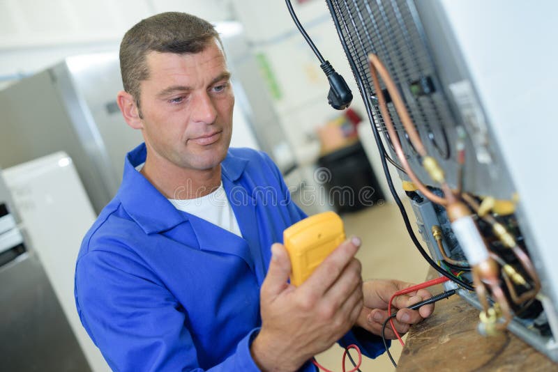 Man testing power stock image. Image of electricity - 312438699