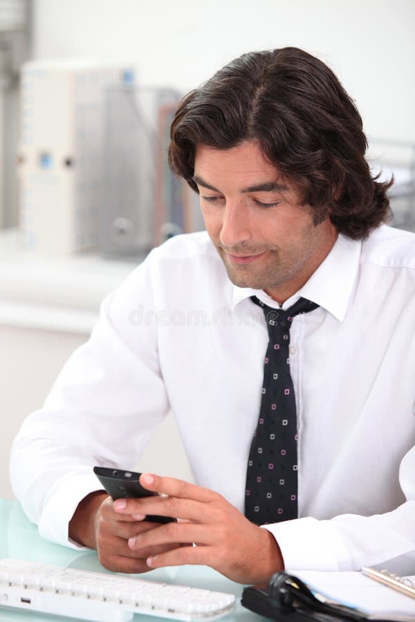 Man text messaging someone stock photo. Image of reach - 37035862