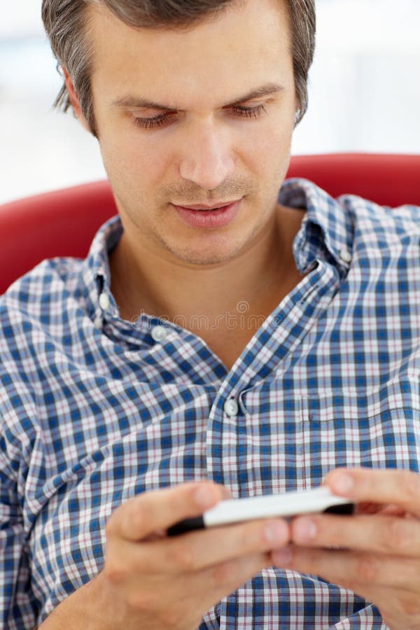 Man texting stock photo. Image of handsome, looking, hair - 21287988