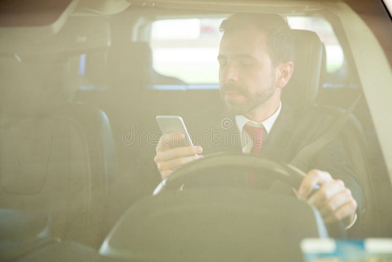 Man Texting while Driving a Car Stock Image - Image of driver, busy ...