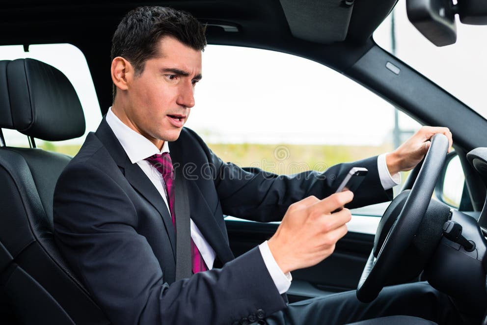 Man Texting while Driving by Car Stock Image - Image of suit ...