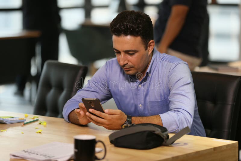Man Texting on Mobile Phone in Cafe. Stock Photo - Image of media ...