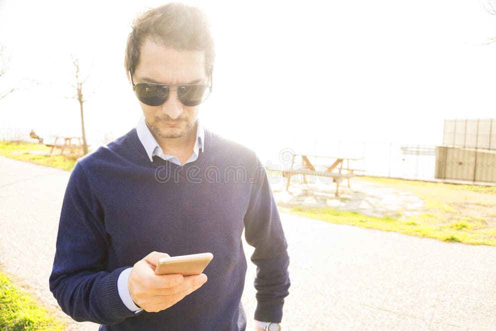 Man texting on phone stock photo. Image of mobile, typing - 149083026