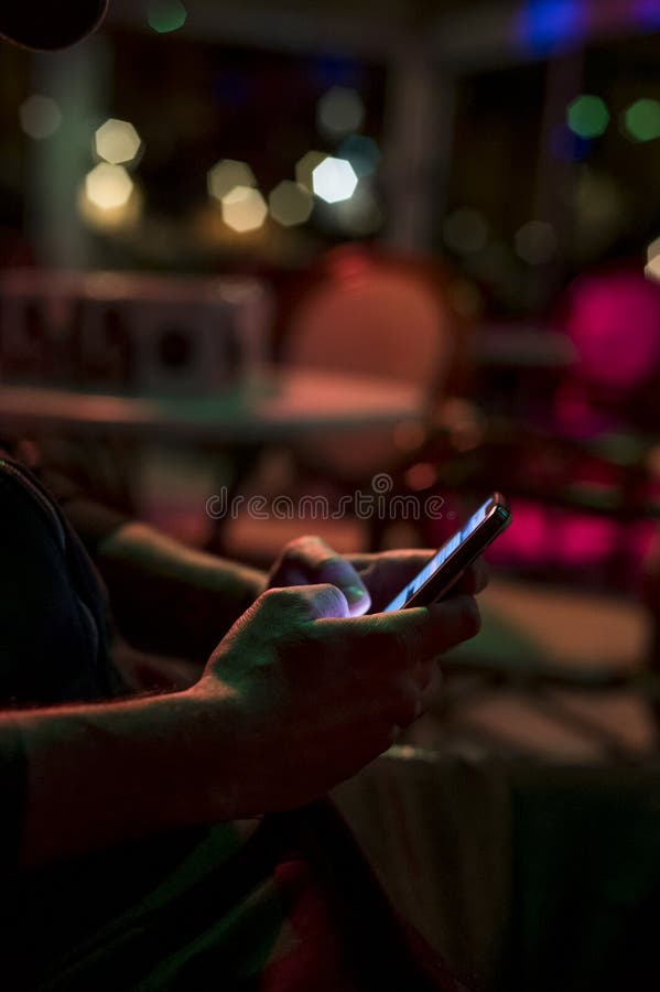 Man Texting on the Phone in the Club Stock Image - Image of nightlife ...