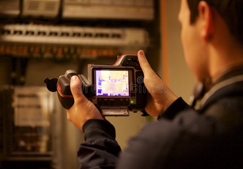Man with Thermal Imaging Camera Checking Electric Installation Stock ...