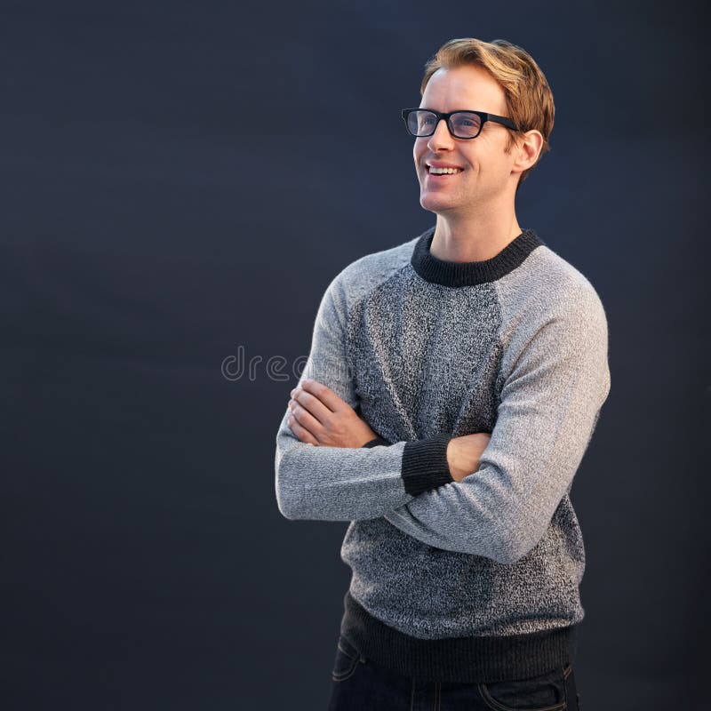 Man, Thinking and Happy Nerd in Studio with Arms Crossed and ...