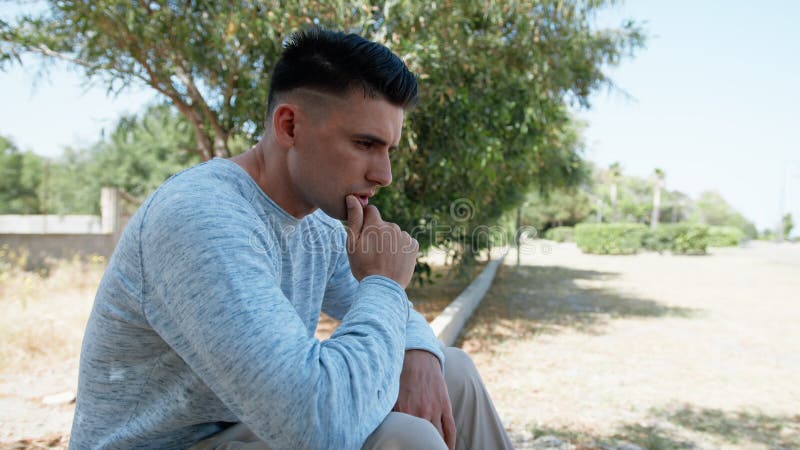 Man Thinking and Reflecting in the Park Stock Video - Video of person ...