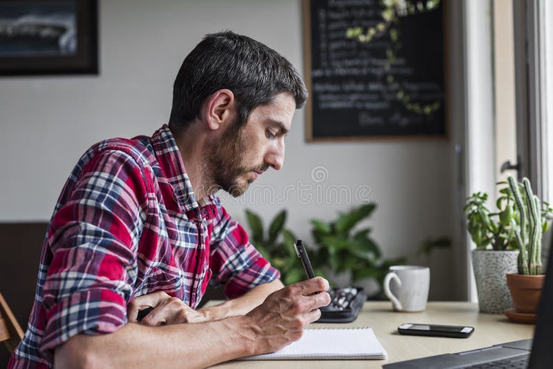 Man Thinking and Writing Down Ideas Stock Image - Image of beard ...