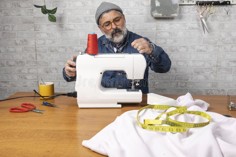 Mature Adult Threading Sewing Machine Stock Photos - Free & Royalty ...