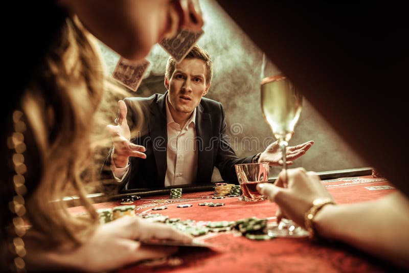 Man Throwing Cards while Playing Poker Stock Photo - Image of together ...