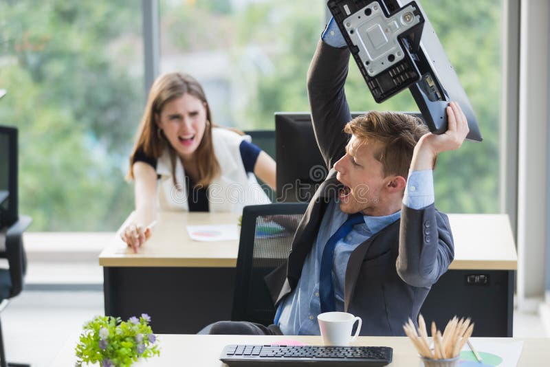 Man Throwing Computer Screen at Female Co-worker Stock Photo - Image of ...