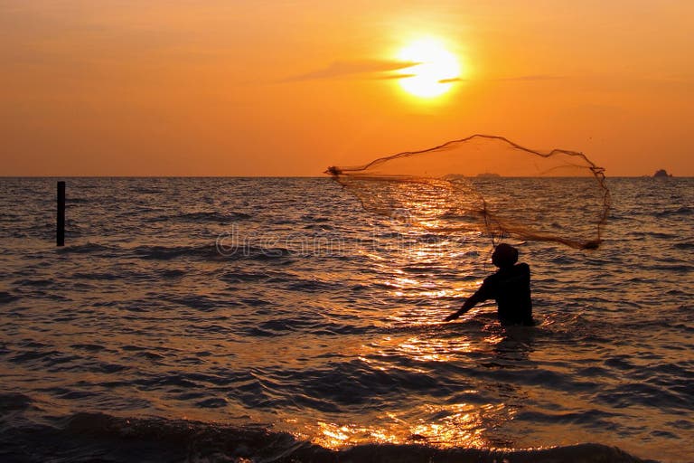 Man Throwing the Fishing Net Stock Photo - Image of ocean, river: 23760414