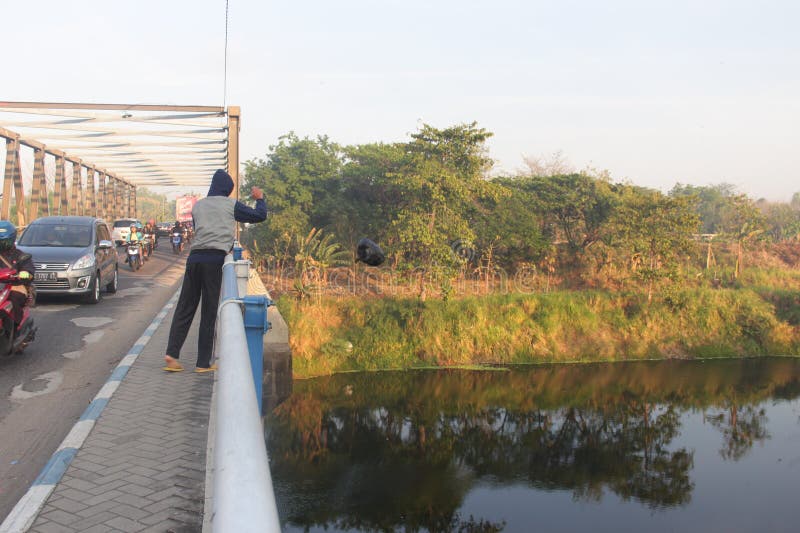 Throwing Garbage In The River