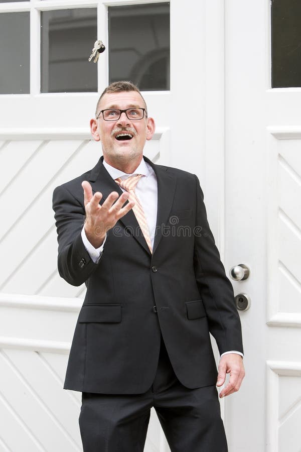 Man Throwing Keys in the Air Stock Photo - Image of close, executive ...