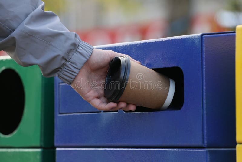 Man Throwing Paper Coffee Cup into Garbage Bin Outdoors, Closeup. Waste ...